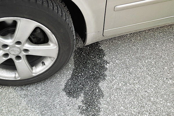 Puddle Under the Car? How to Spot and Address Dangerous Brake Fluid Le